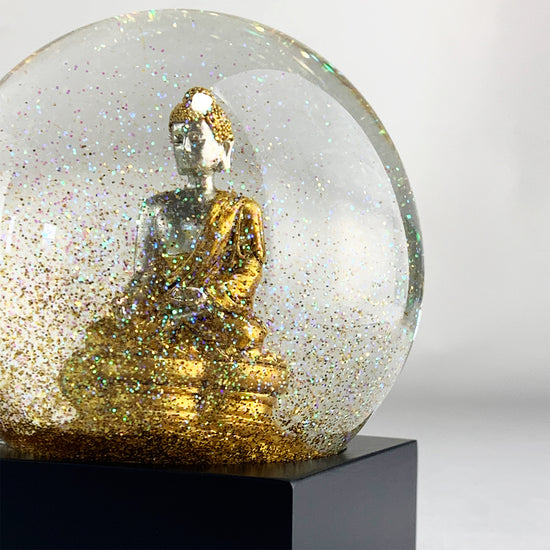 Spiritual Snow Globe with a Rustic Design - DharmaCrafts